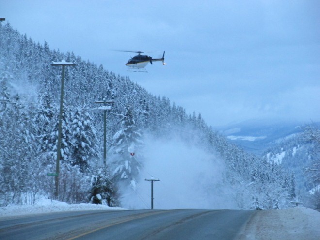 BC Hydro at work: Helicopter blasts snow, ice off power lines